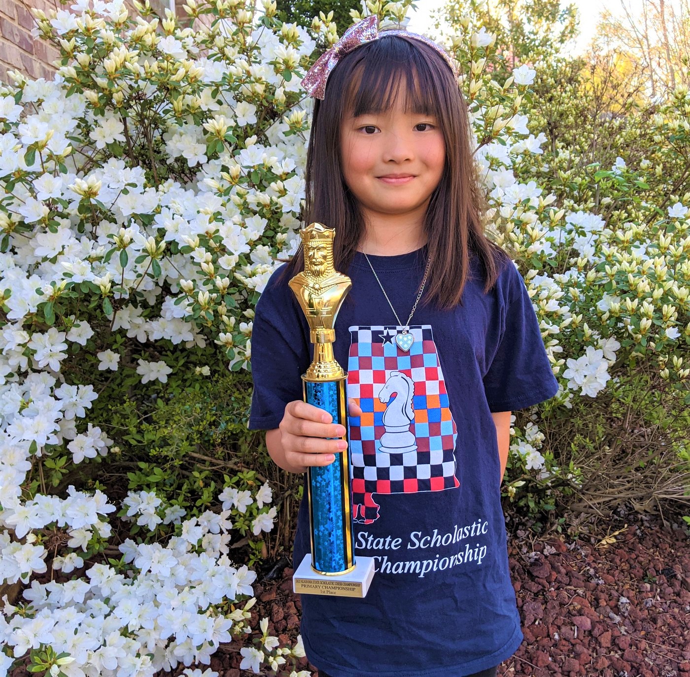 Horizon second-grader Kylie Zou plays perfect game in chess ...